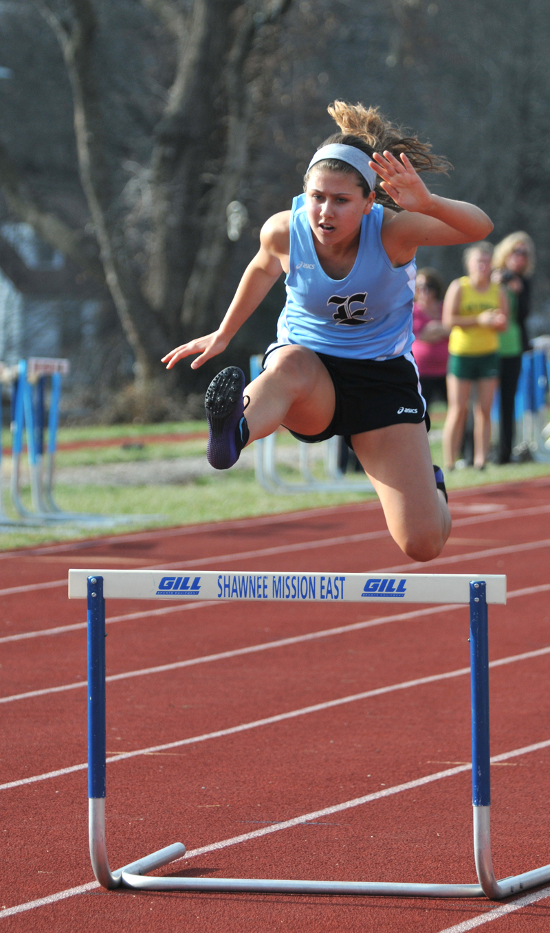 Junior Audrey Danciger hurdles during the 300 meter race. Photo by ...