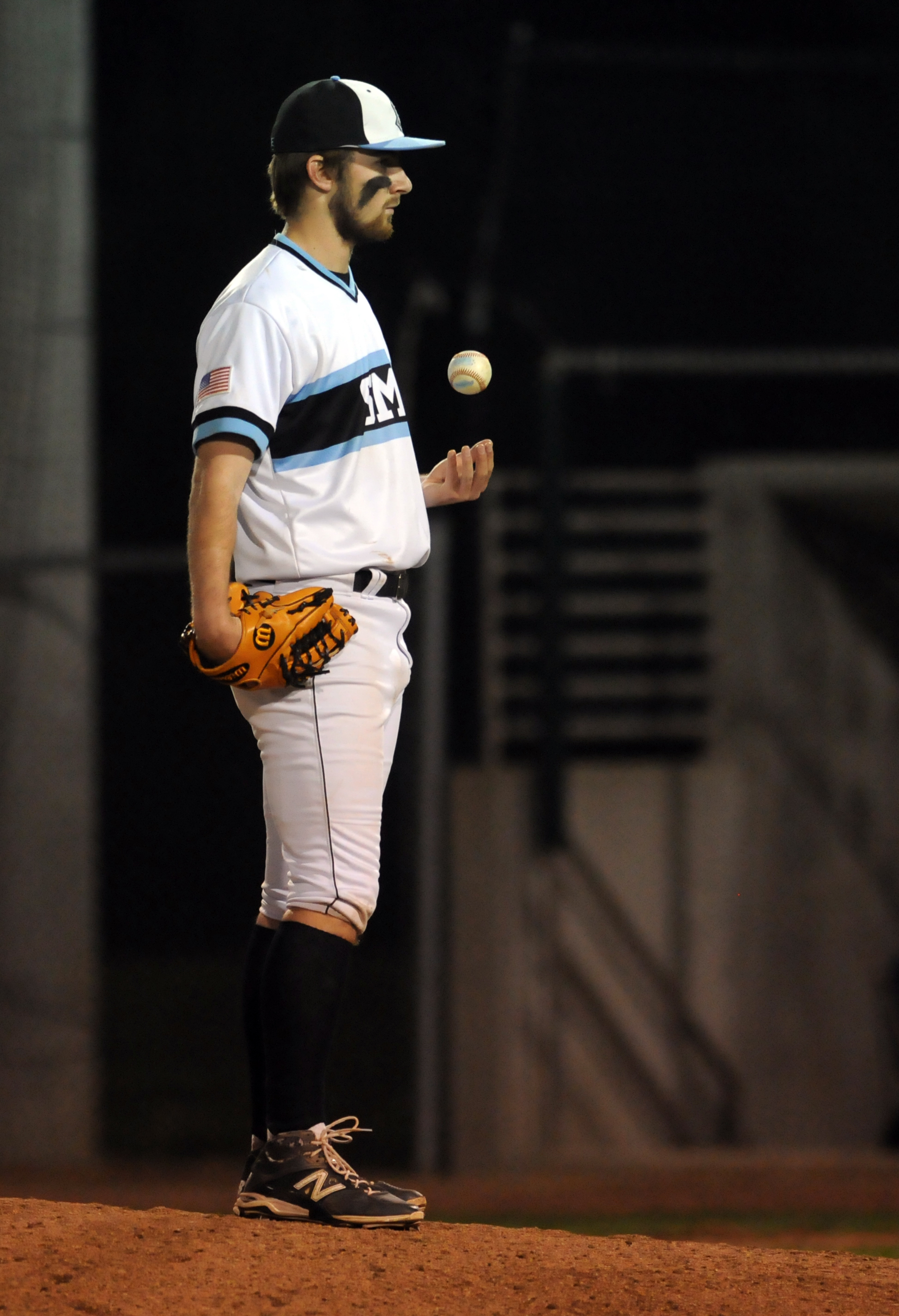 Senior Trey Austin waits as an Olathe South player steps up to the ...