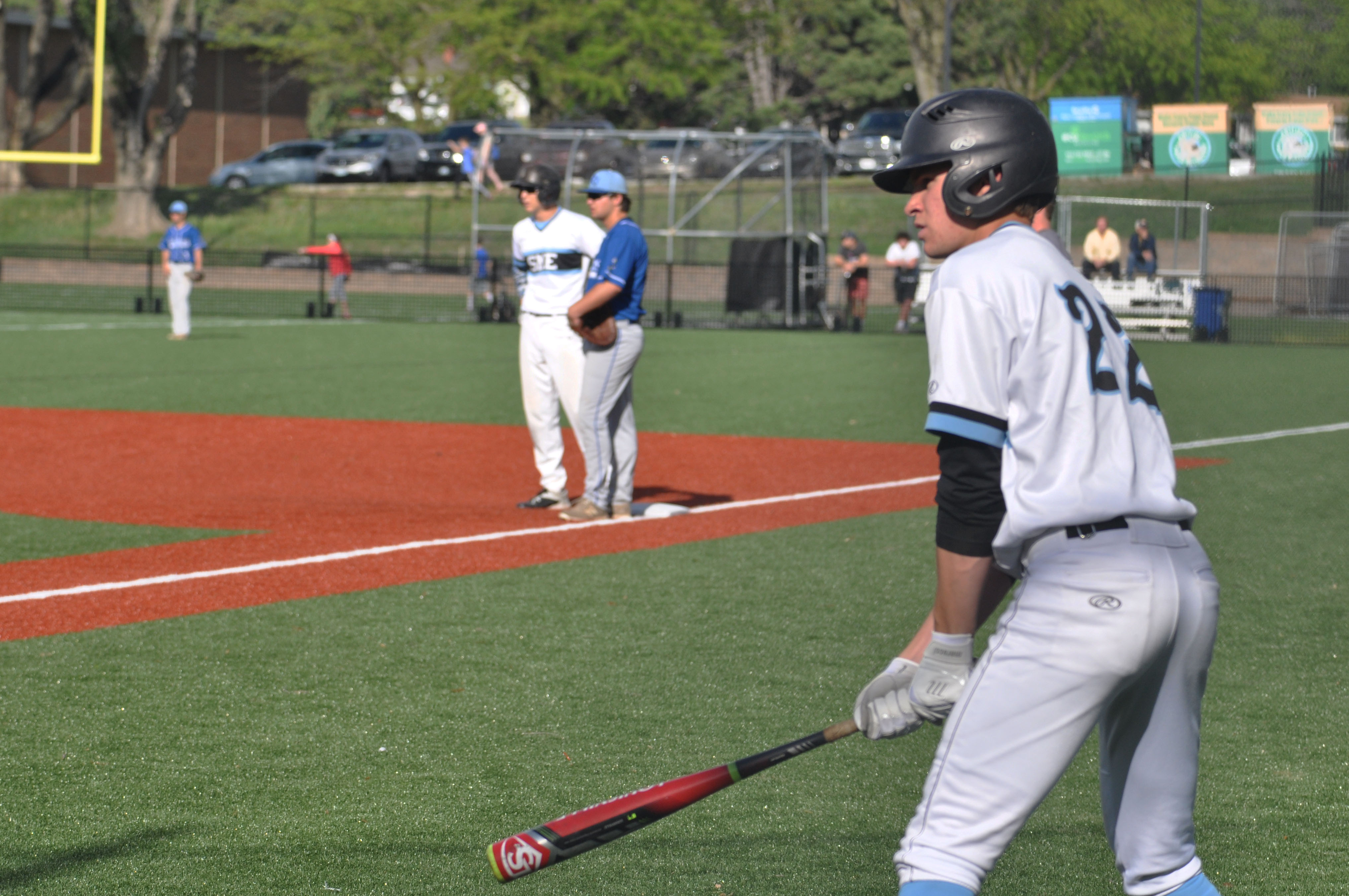 Junior Luke Anderson warms up to hit next. Photo by Carson Holtgraves ...