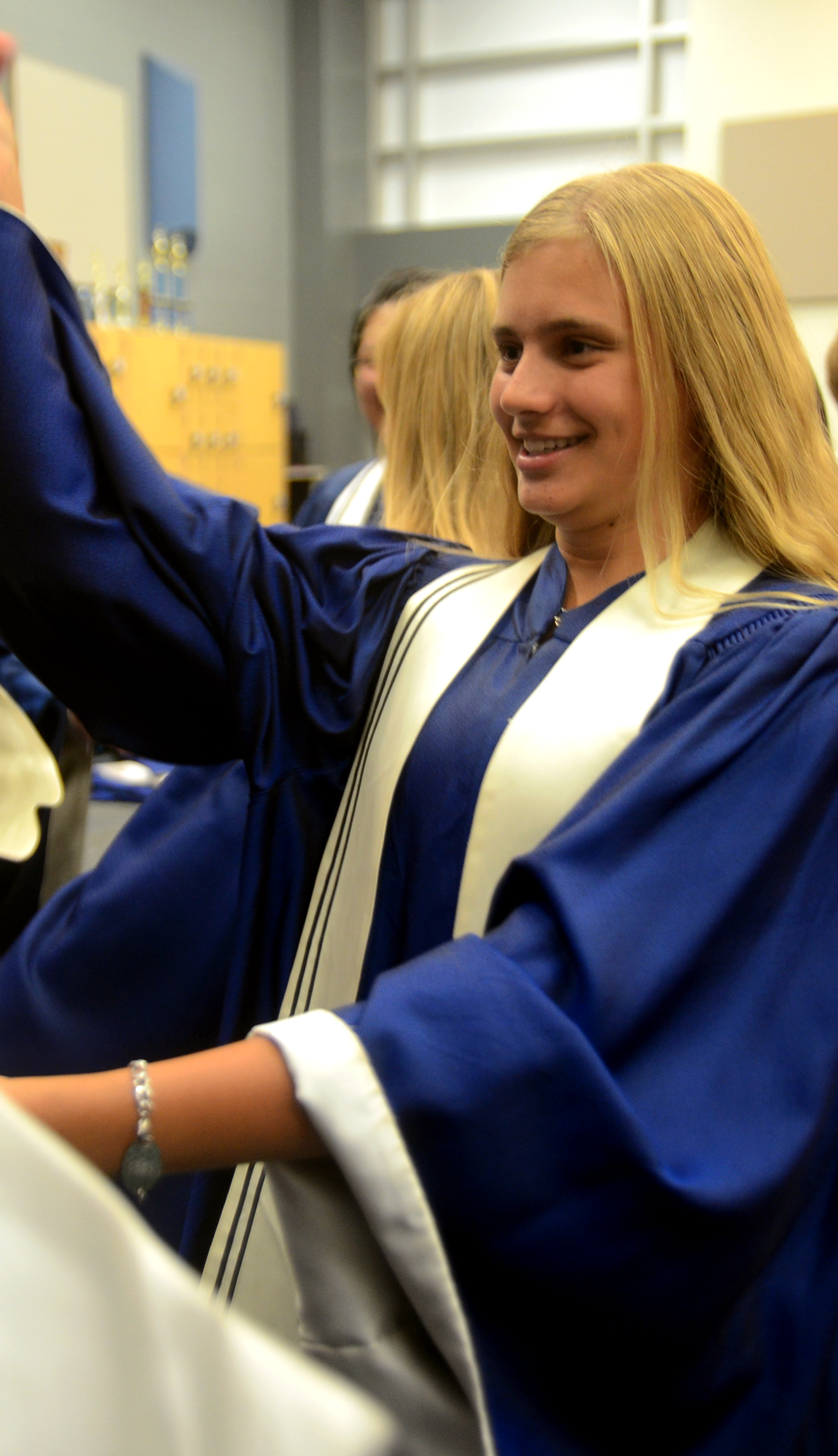 Sophomore Gretchen Ternus talks with her friends before her turn to ...