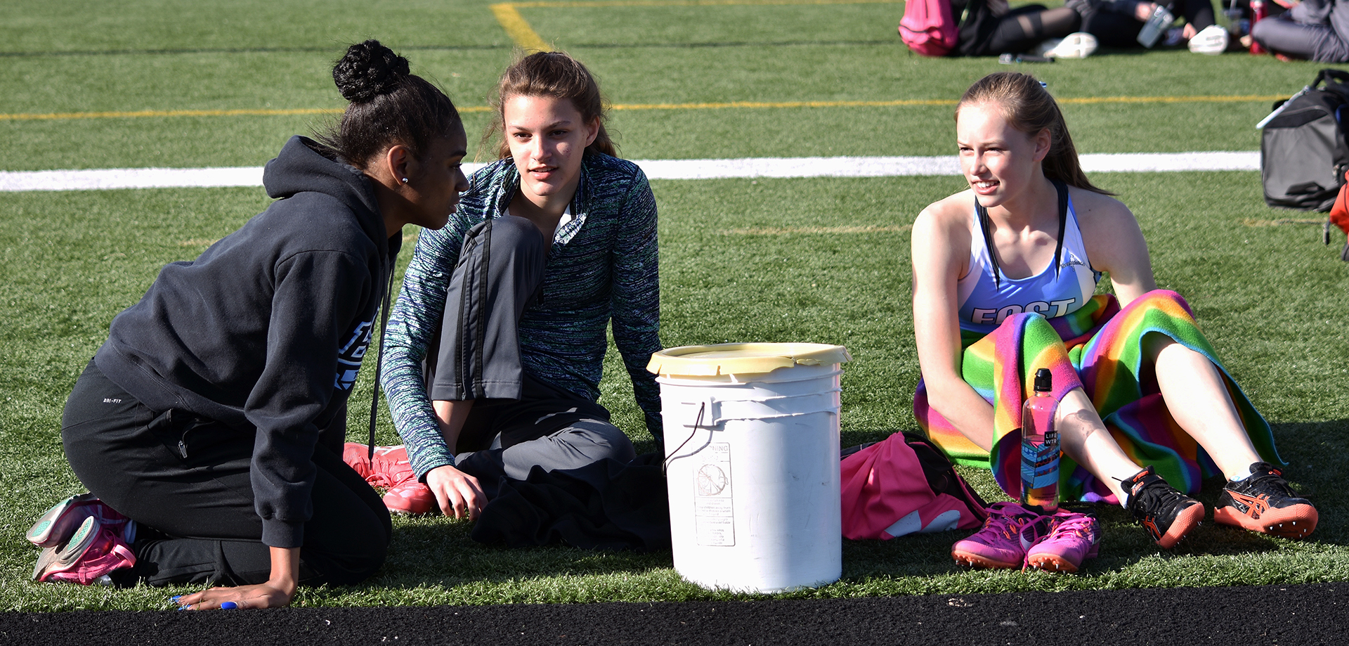 Sophomore Destiny Ray gives Carly Hendrickson and Jessie Stindt a pep ...