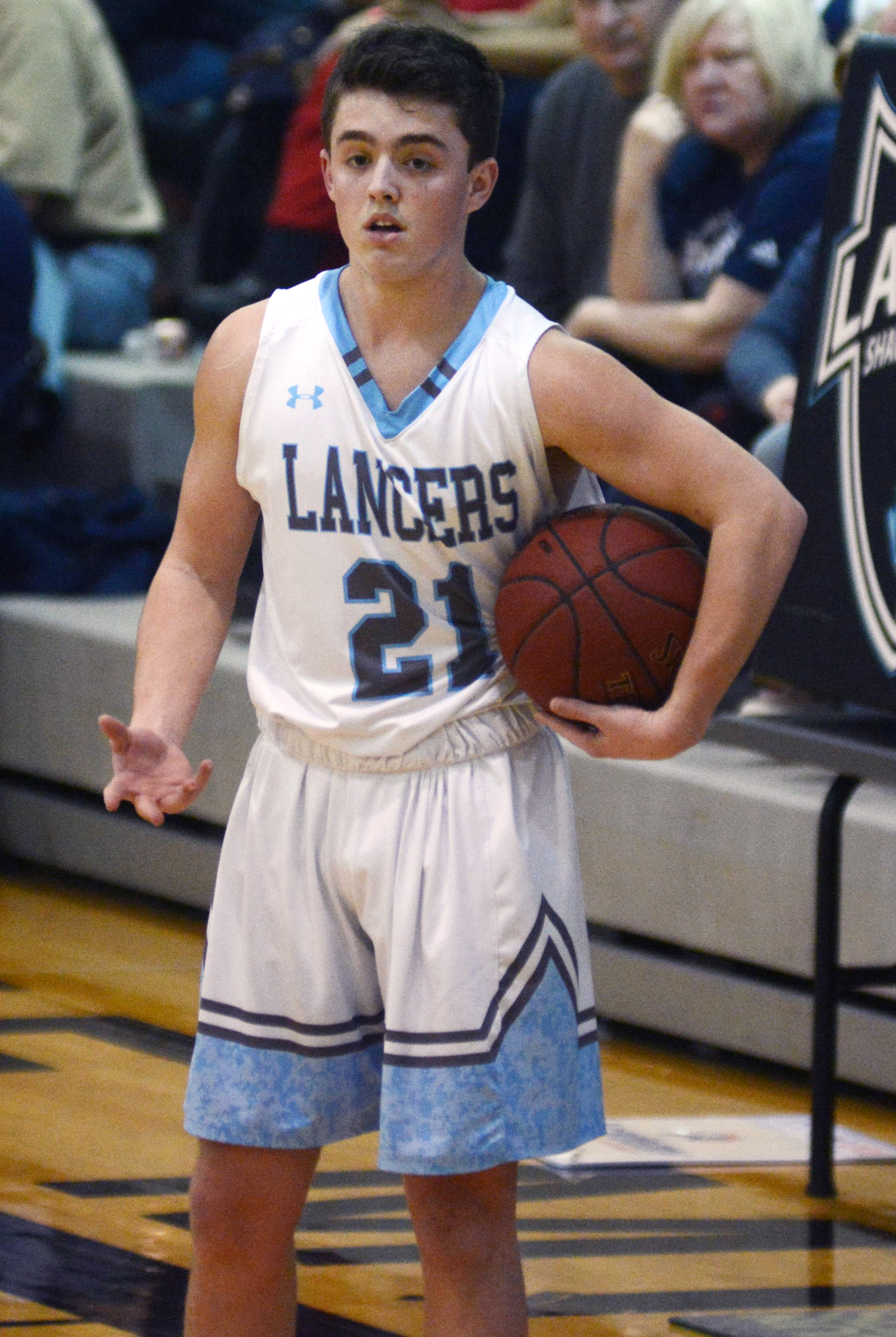 Senior Charlie Moreland waits for one of his teammates to get open ...