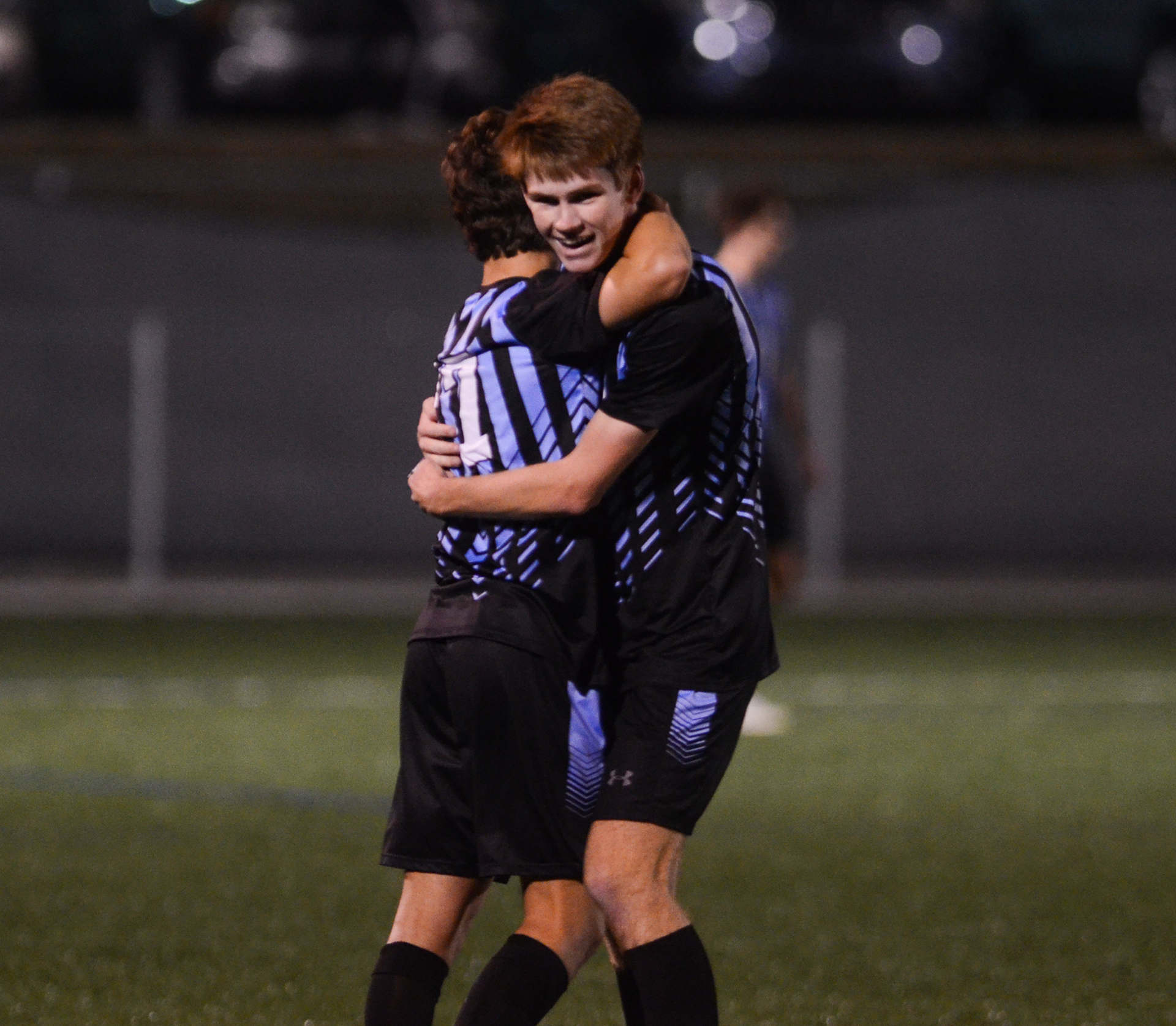 Sophomore Caden Nicholson hugs senior Conor O’Toole after scoring the ...