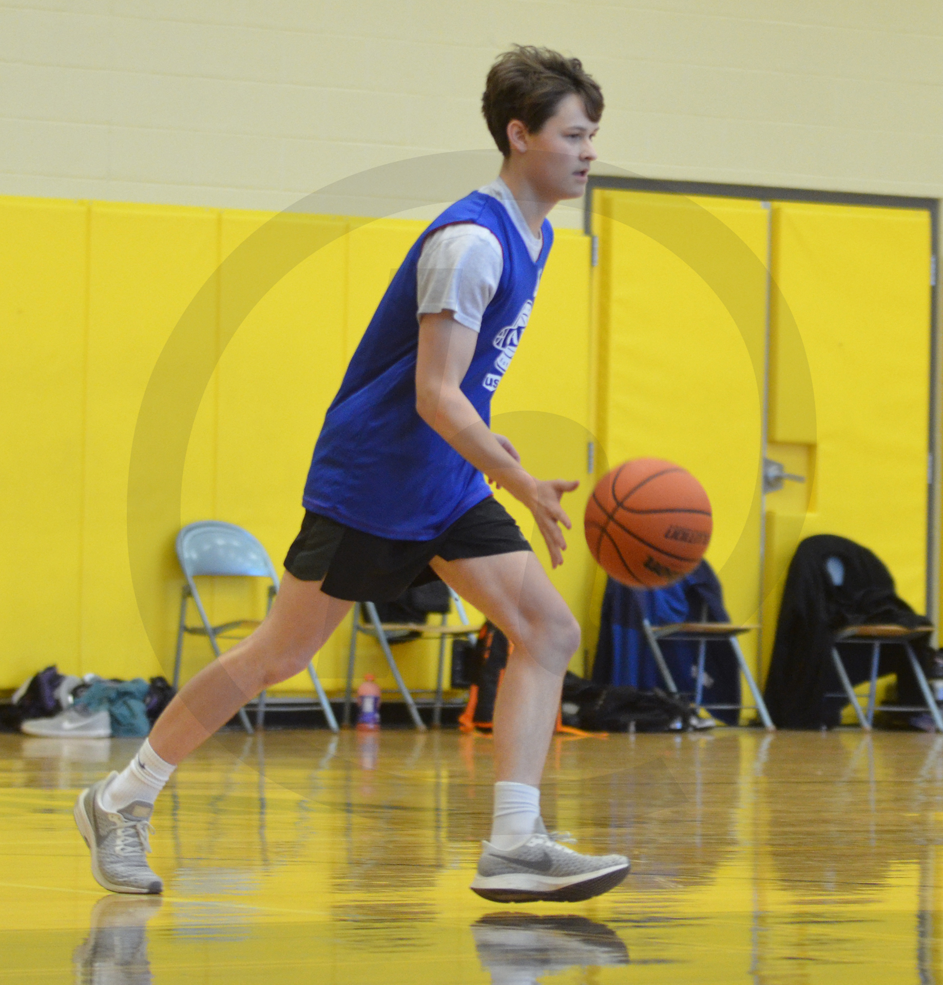 Sophomore Dom Zanone runs the ball down the court once he sees a chance ...