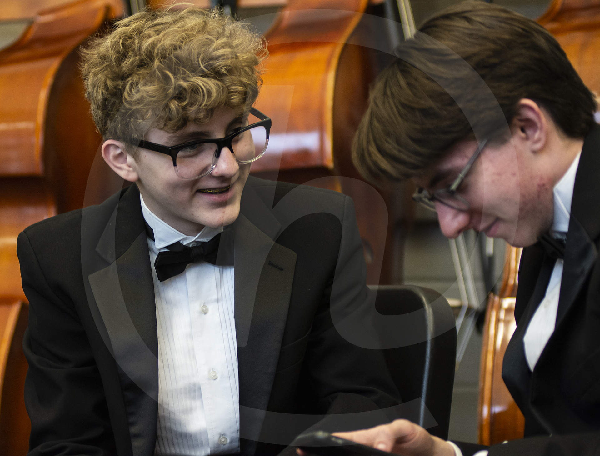 Freshman Darwin Seuver laughs with Senior Sam Sokoloff at a meme. Photo ...