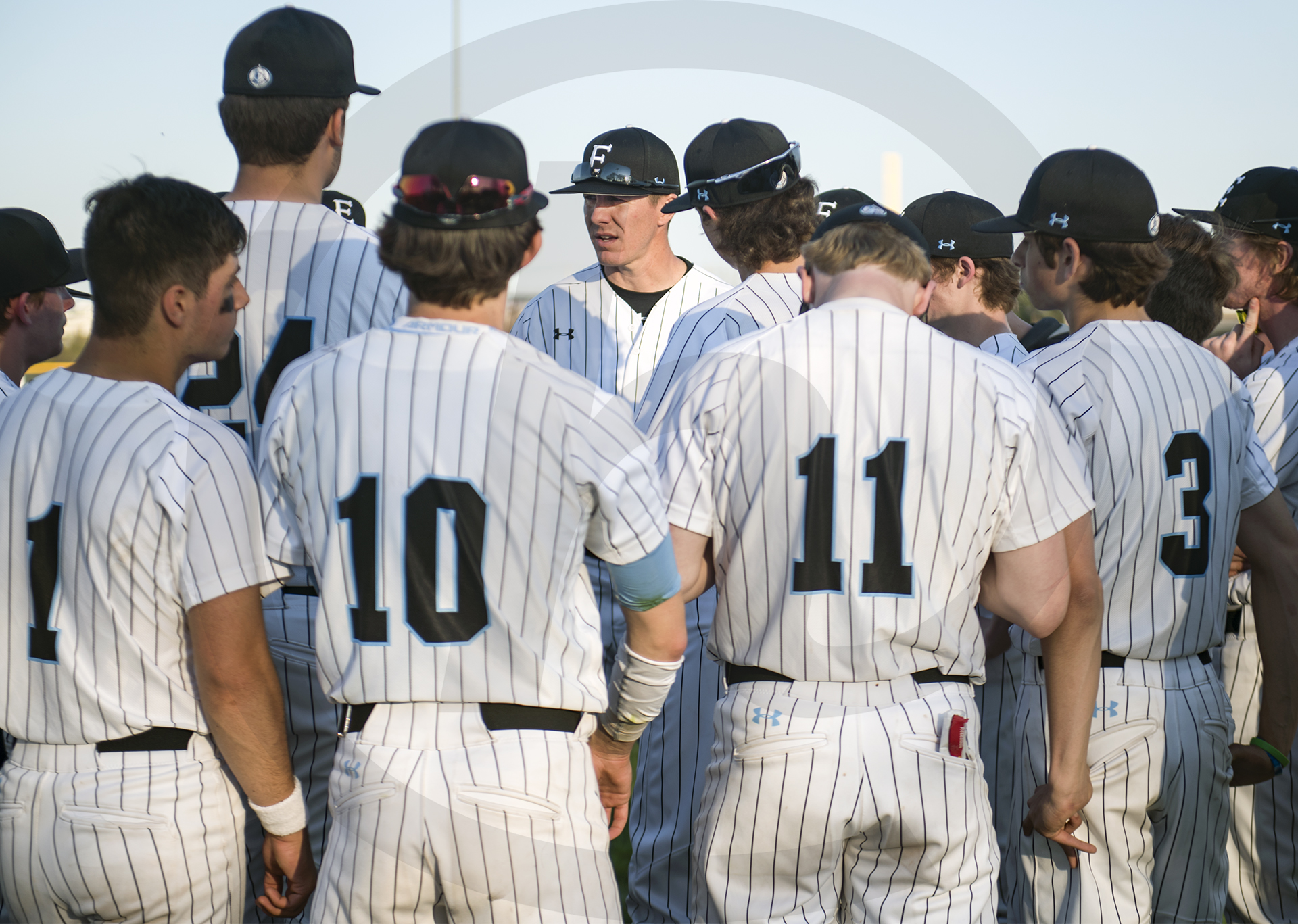 At the end of the game varsity head coach Will Gordon talks to the team ...