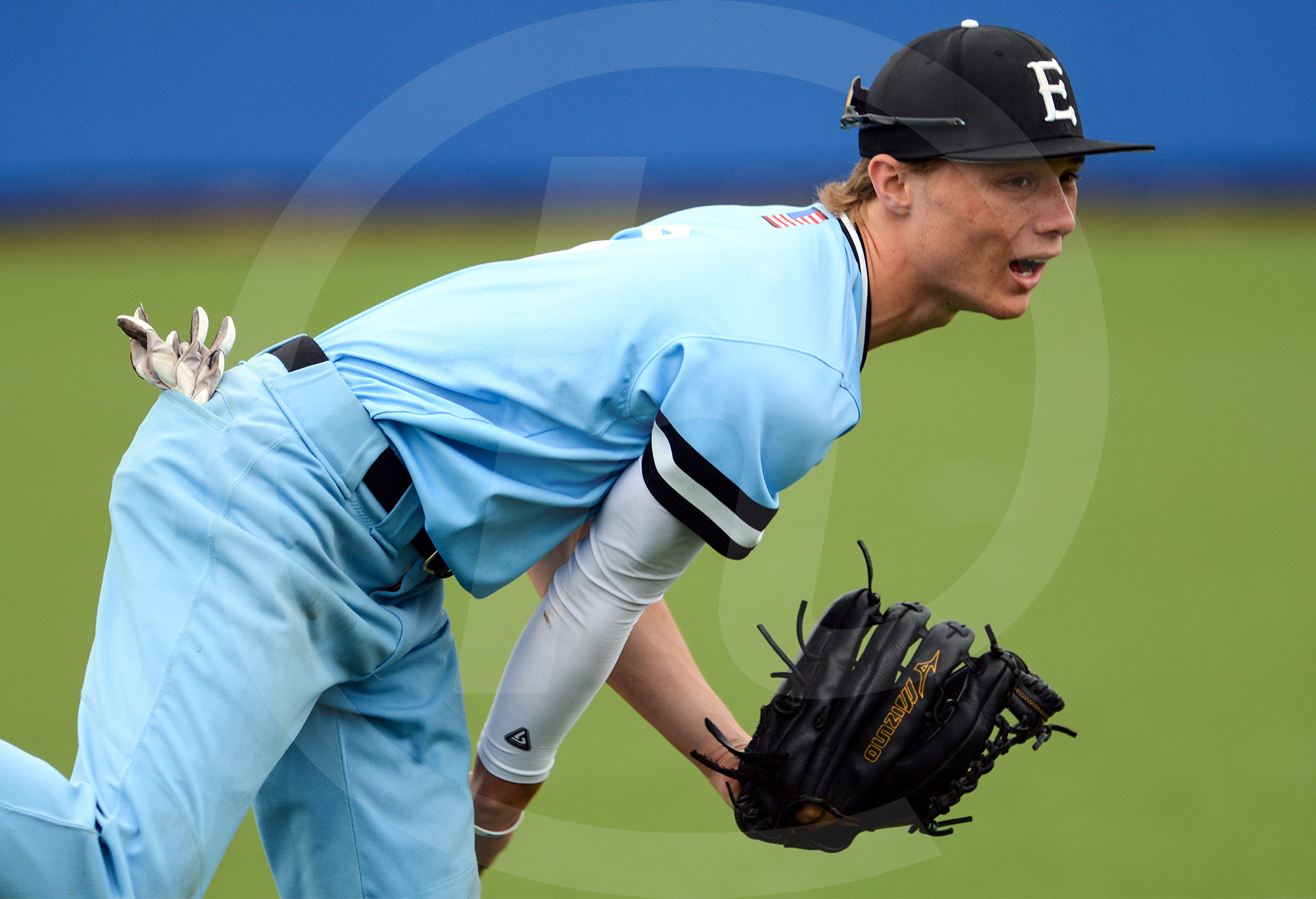 Senior Zach Bass throws a baseball to sophomore Ben Beikmann between ...