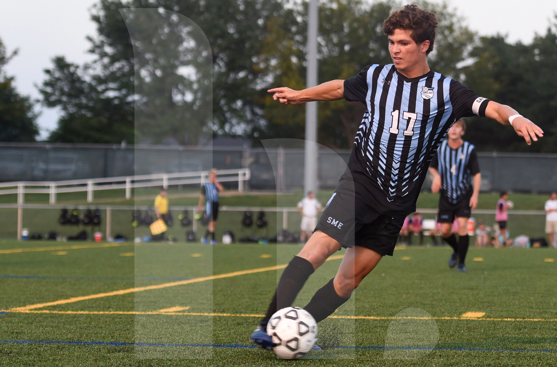 Junior Caden Nicholson dribbles the ball away from a Gardner player to ...